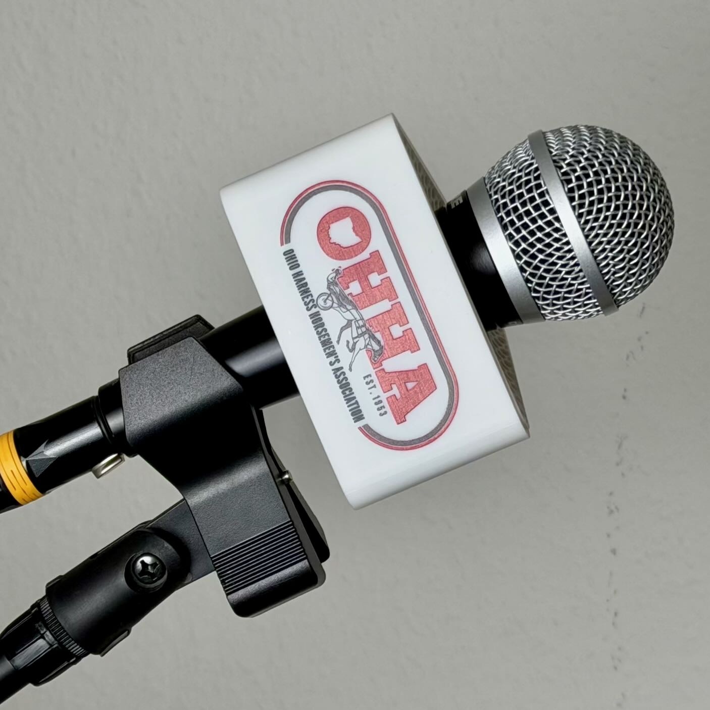 Customised flags and windshields for microphones